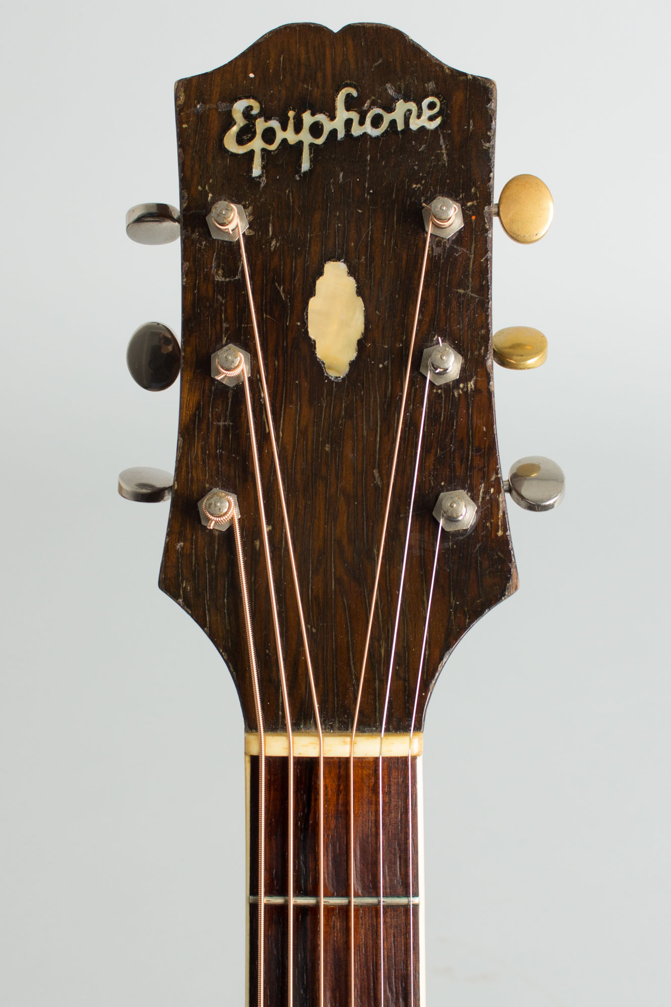 Help! Should I buy this or does it look fake??? The headstock is weird ...